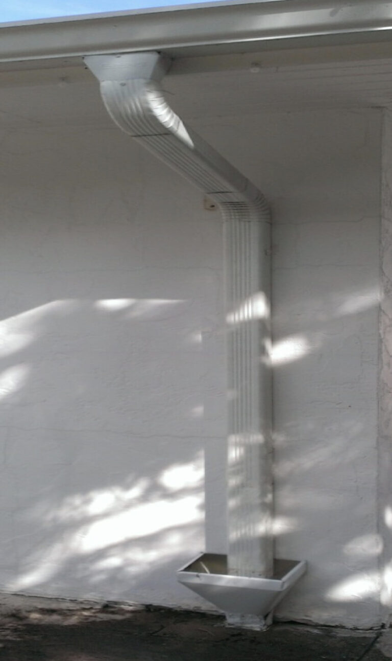 Excel Roofing's Downspout Cleanout System | Excel Roofing